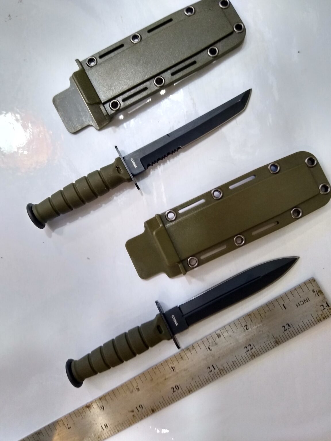 Two small tactical style boot knives with sheaths, 1 tanto and 1 dagger ...